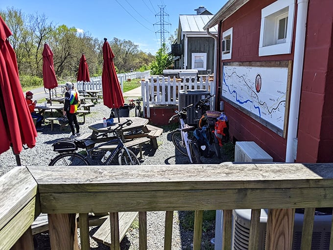The outdoor seating area—where fresh air somehow makes already perfect barbecue taste even better. Picnic tables were invented for moments like this.