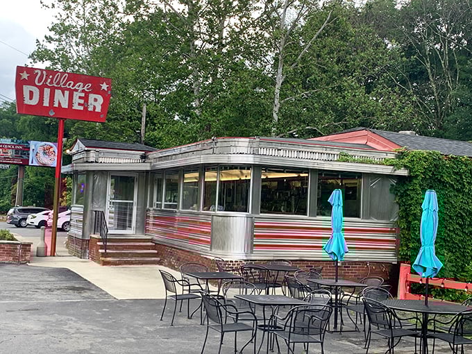 The diner's exterior view shows off its classic lines and vintage charm. Like stepping into a Norman Rockwell painting with better food.