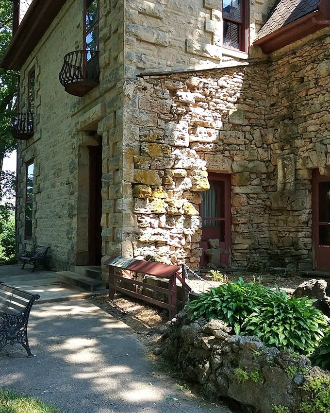 The exterior stonework shows the remarkable craftsmanship of 19th-century masons who built structures meant to last longer than most modern marriages.