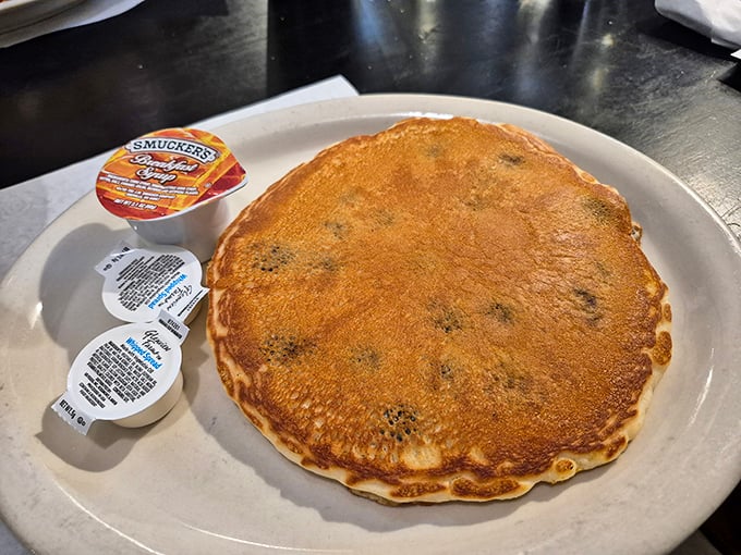 A pancake so perfectly golden it deserves its own Instagram account. Breakfast doesn't get more photogenic—or more delicious—than this.