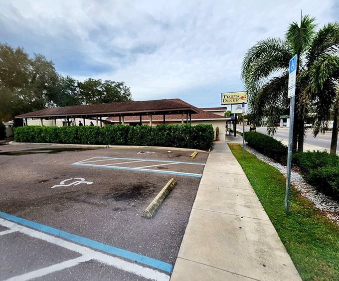 The parking lot might not look special, but it's where hunger arrives and satisfaction departs. Those palm trees add that essential Florida touch.