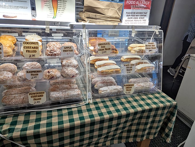 Pennsylvania Dutch pastries behind glass—the kind that make you wonder if calories consumed at flea markets actually count.