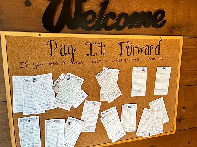 The "Pay It Forward" board isn't just decoration—it's a testament to the community spirit that makes small-town cafes the true social networks of rural America.