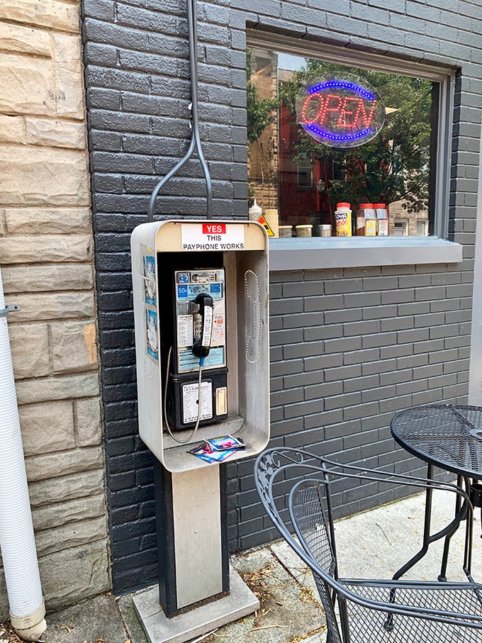 The last working payphone in America stands guard outside Speed's – call everyone you know and tell them about your cheesesteak discovery.