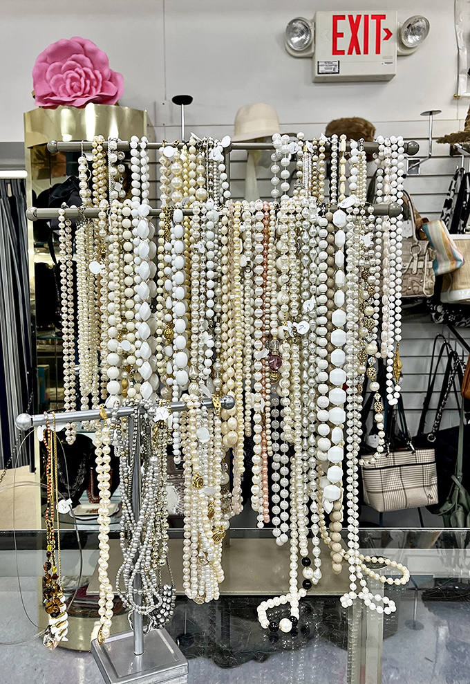 Pearl necklaces cascade like frozen waterfalls, waiting to transform a simple outfit into something Audrey Hepburn might have approved.