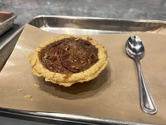 A pecan pie that's small in size but mighty in flavor—the perfect sweet punctuation mark at the end of a meaty sentence.