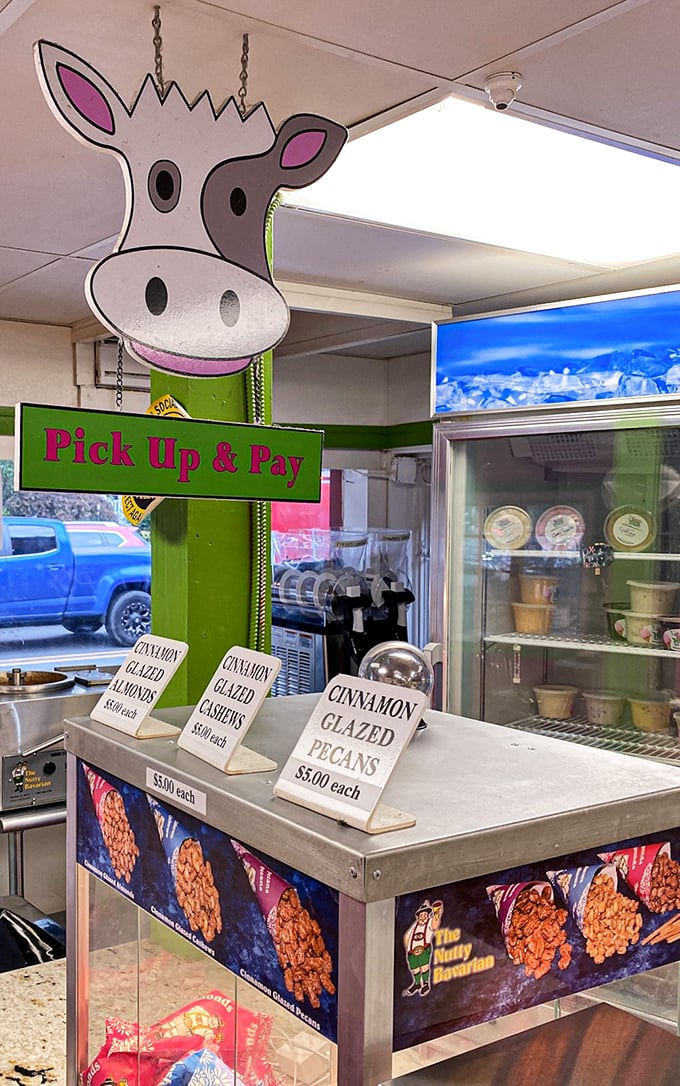 Cinnamon glazed nuts await under the watchful eye of the Moo Hope cow—because sometimes ice cream deserves a crunchy companion.