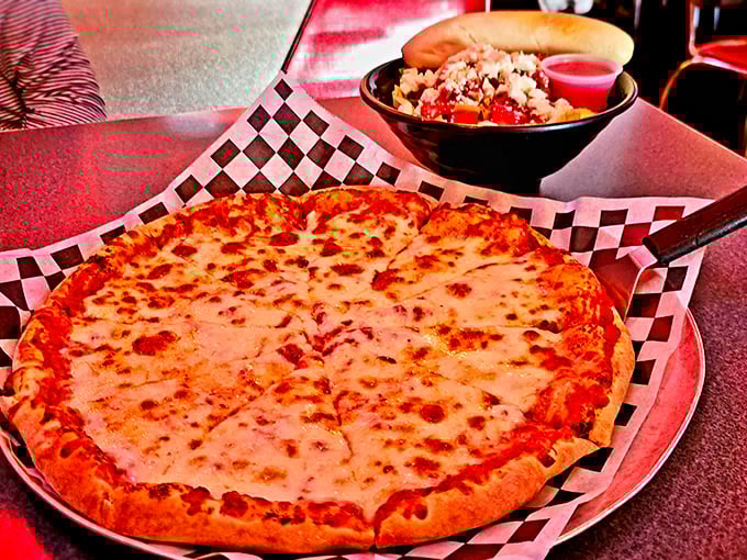 Pizza perfection in its most honest form. That cheese pull would make Instagram influencers weep with joy—but here, it's just Tuesday's dinner.
