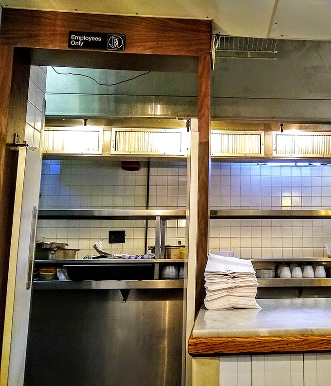 Behind this "Employees Only" door, sandwich magic happens—a glimpse into the kitchen where culinary dreams become reality.