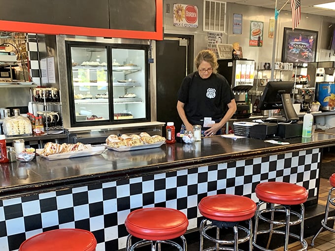 The counter where decisions are made, coffee is poured, and pie temptations sit in plain view—resistance is futile.