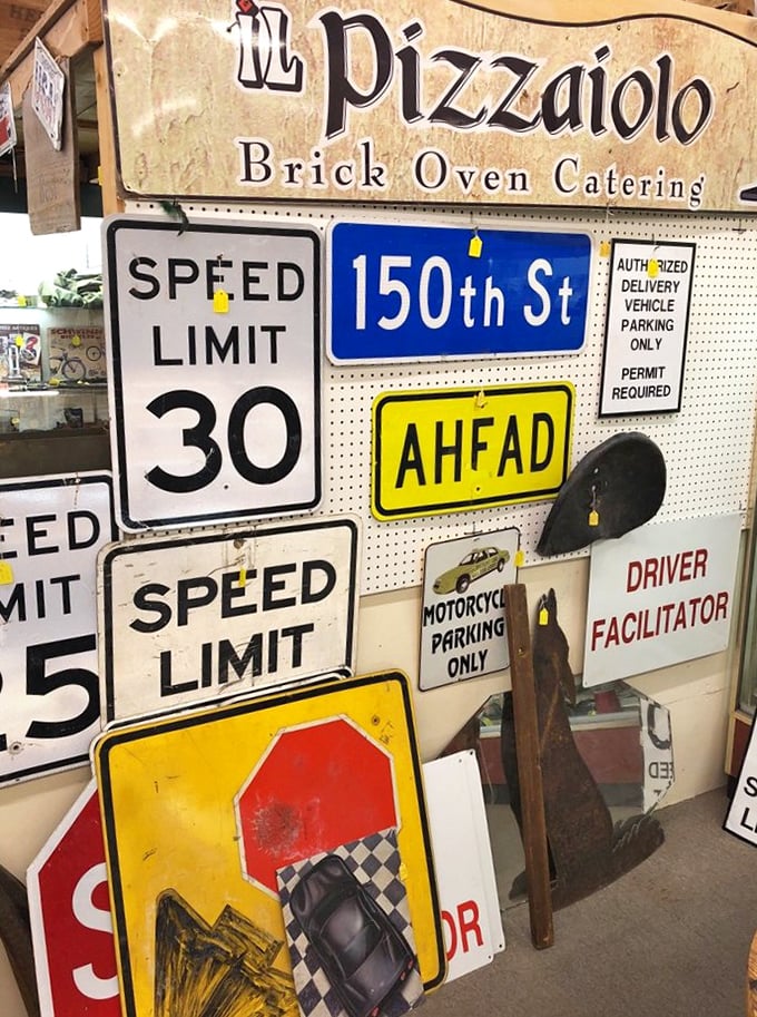 Vintage signs that once guided actual journeys. Now they'll guide conversations in someone's game room or garage.