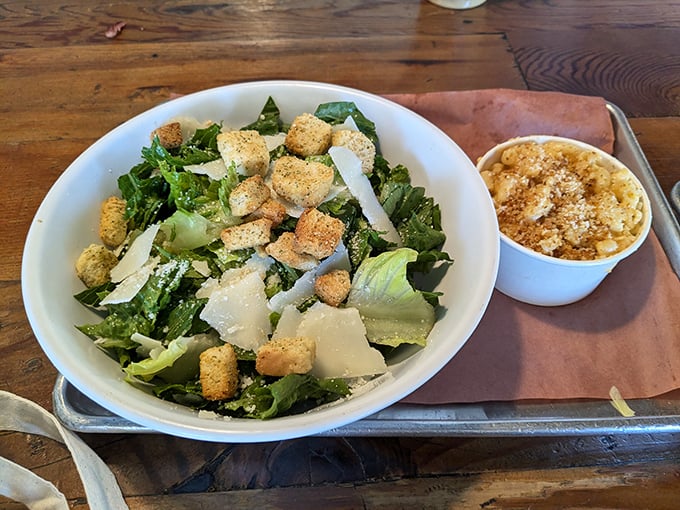 A Caesar salad and mac and cheese that prove sides at Badlands aren't afterthoughts—they're co-stars worthy of their own spotlight.