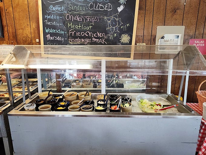 The salad bar and daily specials board—where "Meatloaf Tuesday" isn't just a meal, it's an institution worth planning your week around.
