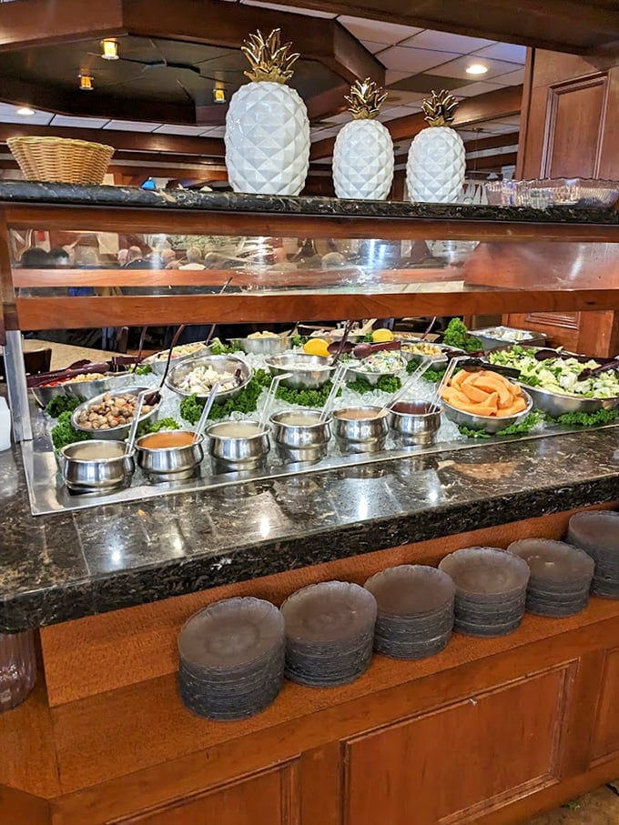 The salad bar crowned with decorative pineapples – a tropical touch in suburban Pennsylvania that somehow makes perfect sense.