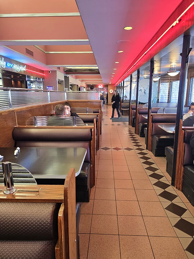 Classic booths line the checkerboard floor – each one a potential setting for first dates, family celebrations, or solving the world's problems over pie.