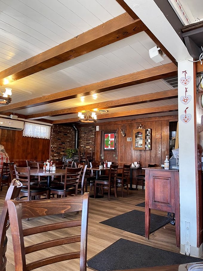 Warm wood tones, exposed beams, and Danish-inspired touches create a dining room that feels both cozy and authentically connected to Solvang's heritage.
