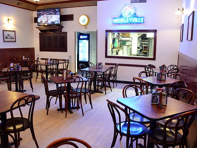 Simple tables, classic chairs, and a window into the kitchen—because when the food's this good, you don't need fancy surroundings.