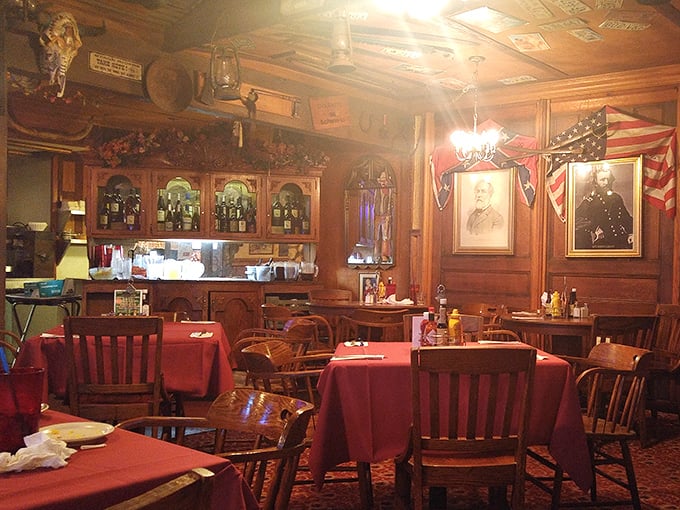 The dining room balances rustic charm with unexpected elegance—red tablecloths under wooden beams where history and hunger meet.