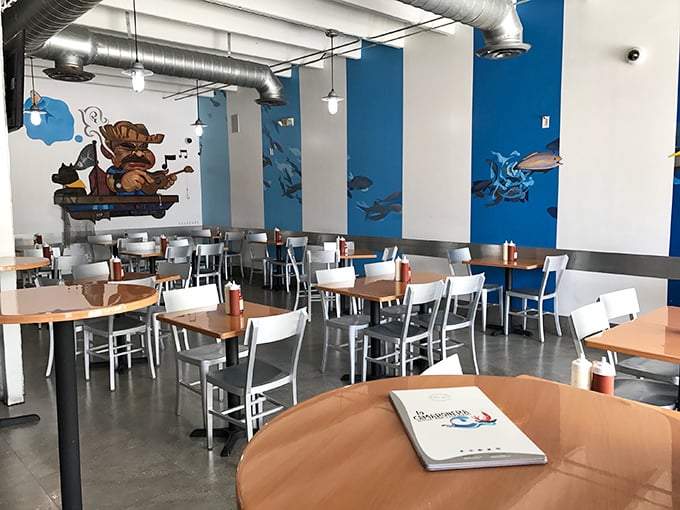 Blue ocean murals and exposed ductwork create the perfect backdrop for seafood feasting. Like dining underwater, but with better air conditioning.