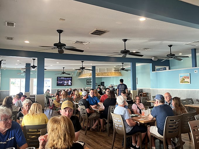 Where food meets fellowship—Palm Pavilion's dining room buzzes with the happy chatter of beachgoers refueling after sun-soaked adventures.