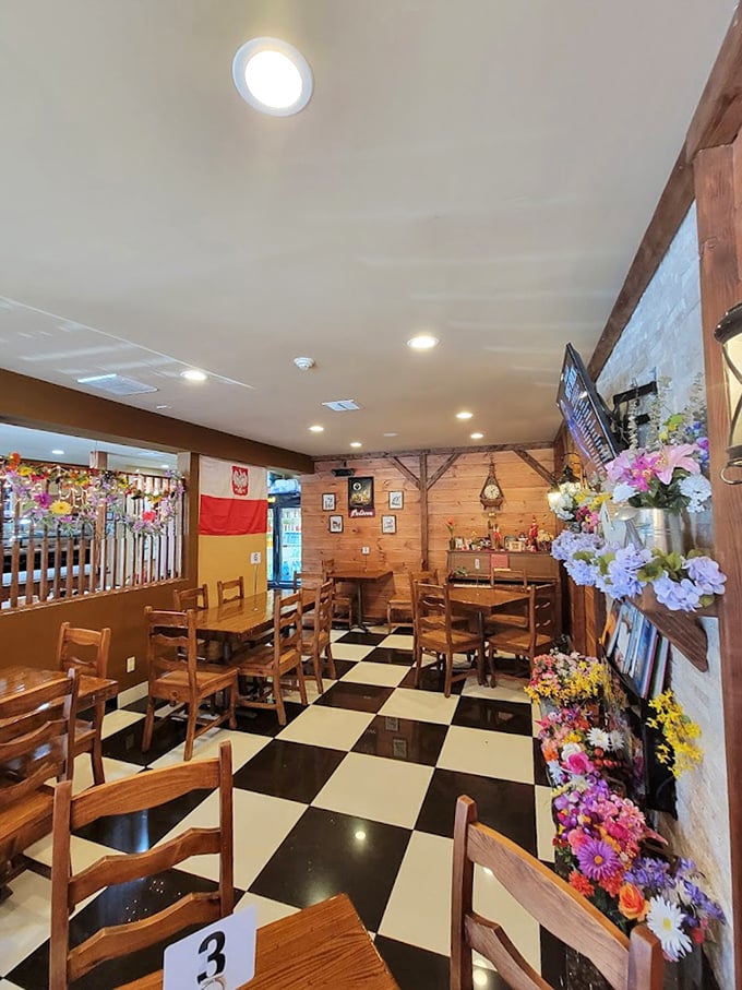 The dining room's checkerboard floor and wooden beams create an atmosphere that's both homey and special—like Sunday dinner at your favorite relative's.