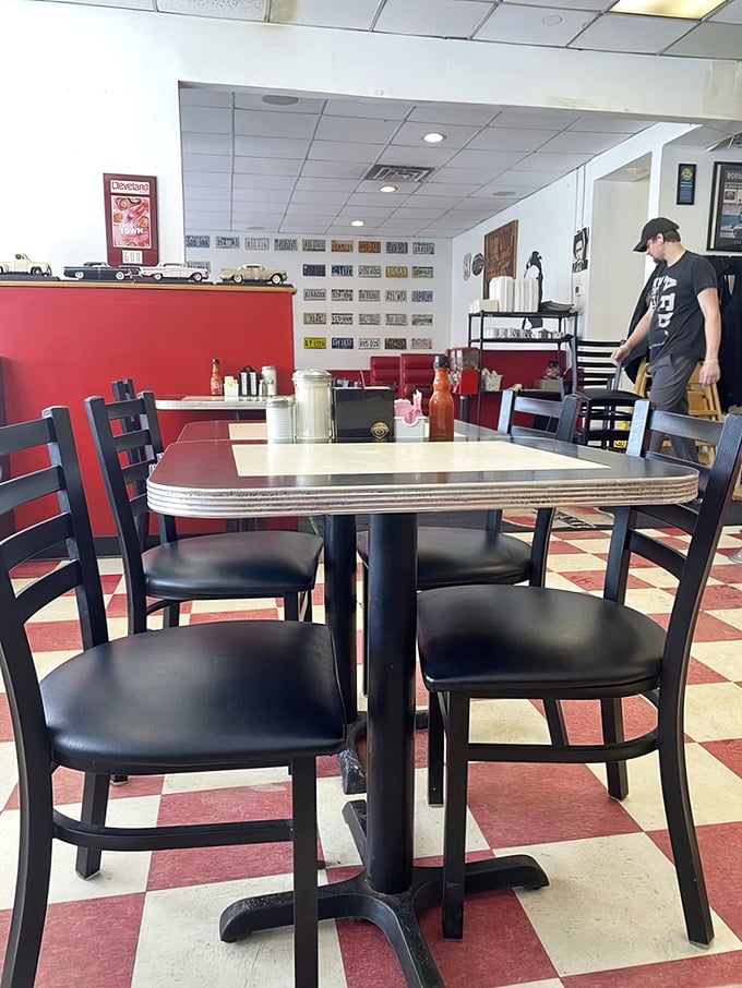 Tables positioned for the perfect balance of privacy and people-watching—an essential component of the authentic diner experience.