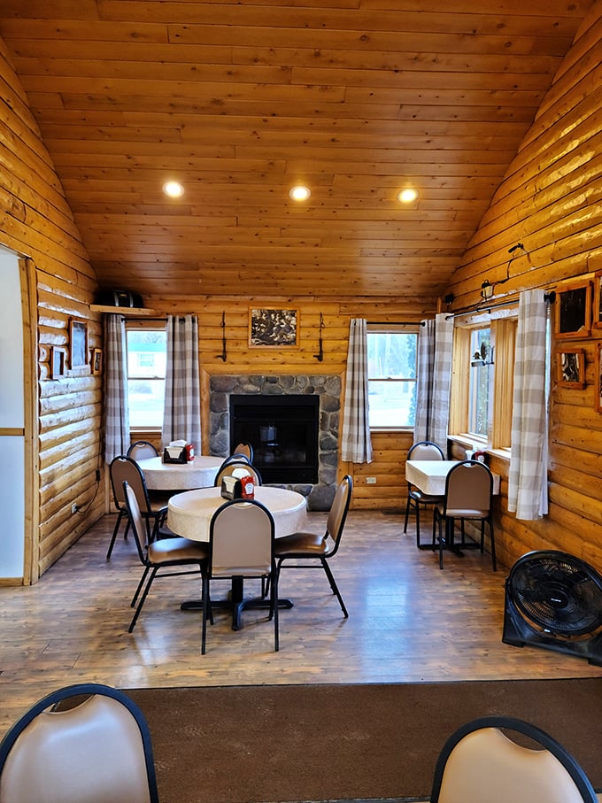 That stone fireplace adds cabin coziness to your dining experience – like eating at a friend's lake house.