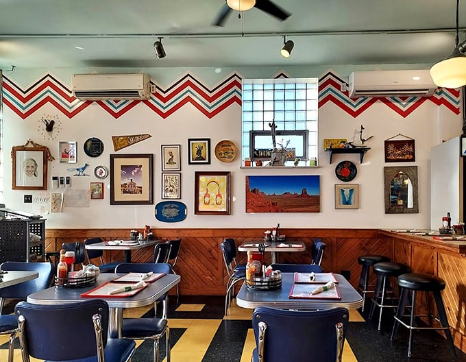 Chevron patterns and gallery walls create a space that's equal parts art installation and comfort zone—somewhere between Santa Fe and St. Louis.