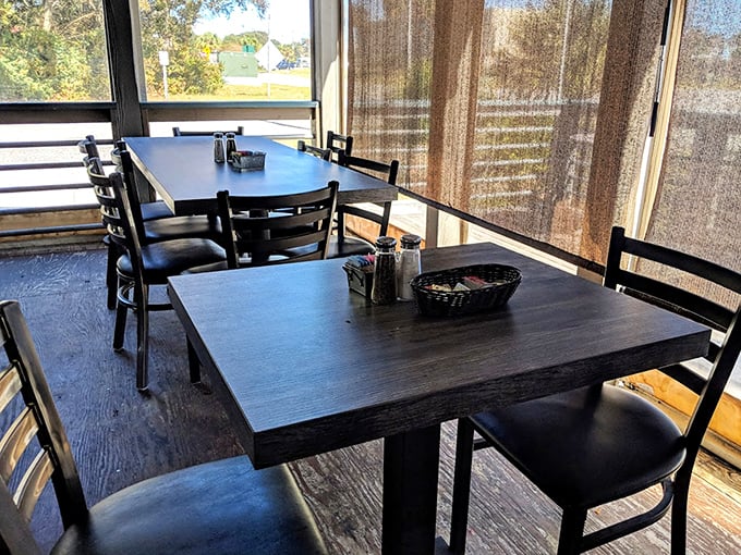 Simple tables by sun-filtered windows—because when the food is this good, you don't need fancy chairs or white tablecloths to feel special.