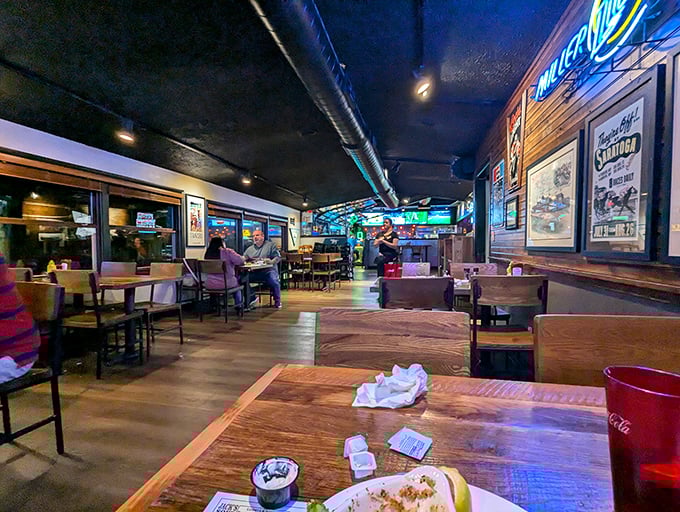 Dark ceilings, warm lighting, and wooden booths create the perfect backdrop for making memories over meals that matter.
