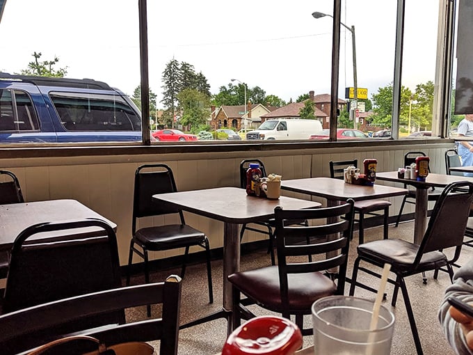 Window seats for neighborhood watching. These tables offer prime real estate for both people-watching and serious sandwich contemplation.