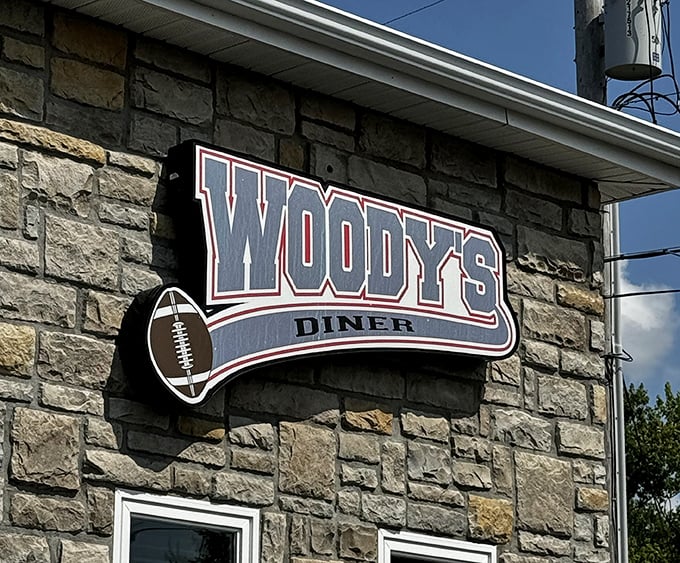 That football on the sign isn't just decoration—it's a promise that sports and good eating live together in perfect harmony here.