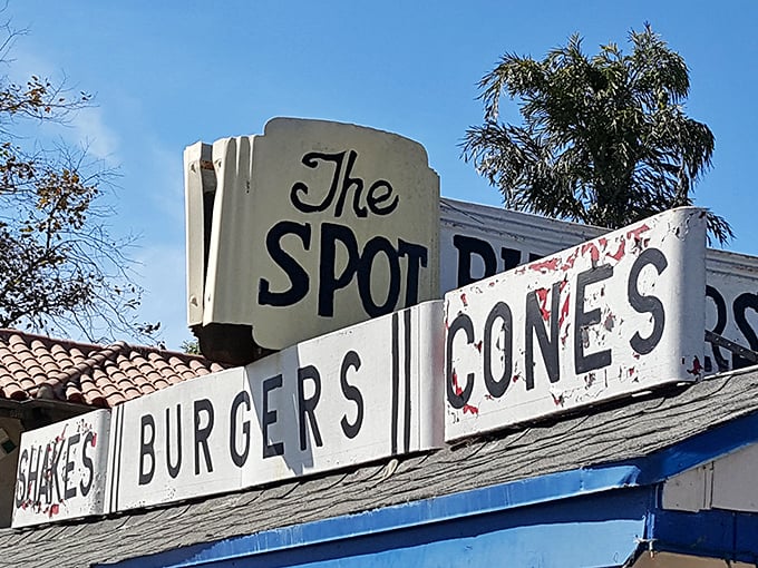 Signage that's weathered decades of ocean air and still proudly announces its purpose. "The Spot" isn't just a name—it's a well-earned title.