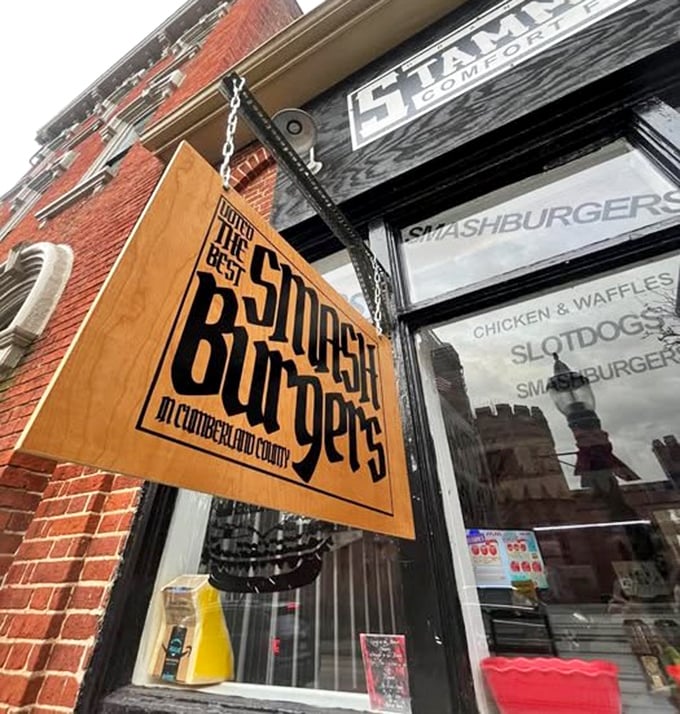 "Smash Burgers" proclaims the wooden sign, hinting at the secondary specialty that keeps customers coming back.