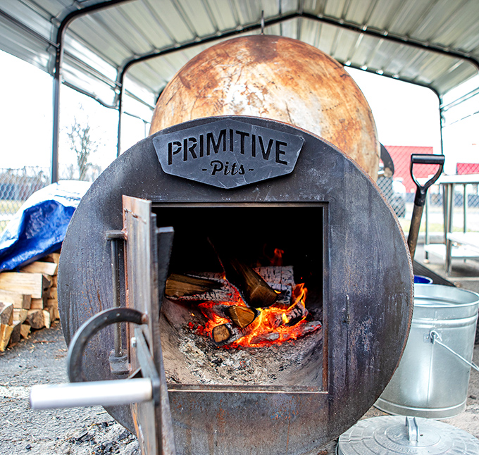 The smoker—where the magic happens. Like a medieval forge, but instead of swords, it produces edible treasures.