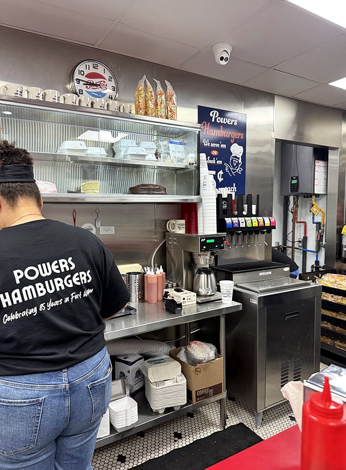 The staff at Powers wear their history proudly on their backs, carrying decades of burger-flipping expertise into each new day.