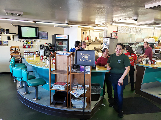 "Hostess Will Seat You" isn't just a sign—it's a promise that someone is waiting to welcome you into the Keedy's family.