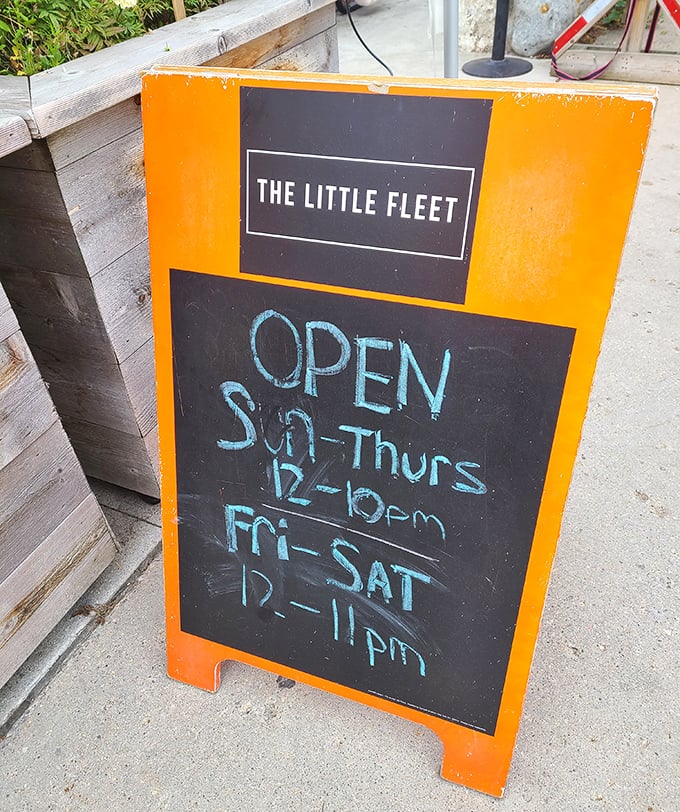 Sometimes the most honest advertising is scrawled in chalk—open Sunday through Thursday 12-10pm, Friday and Saturday 12-11pm. Plan accordingly.