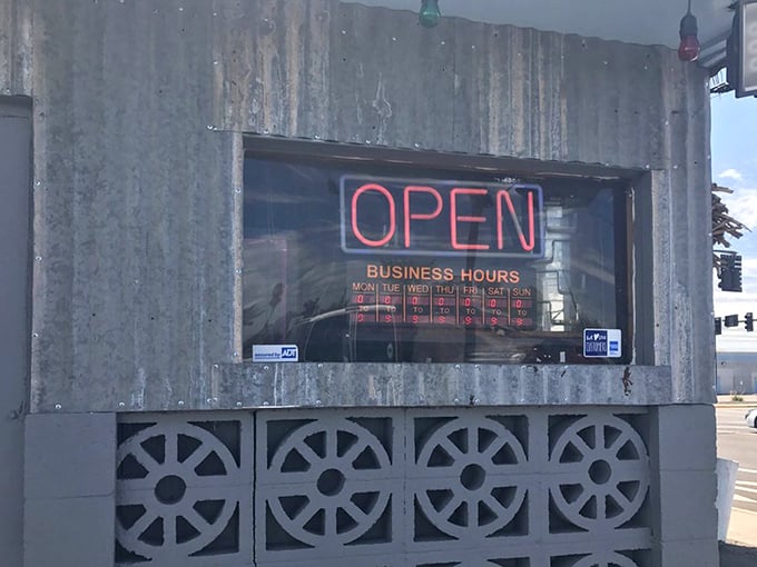 The "OPEN" sign that's launched thousands of seafood cravings. Those business hours are your window to desert seafood paradise.