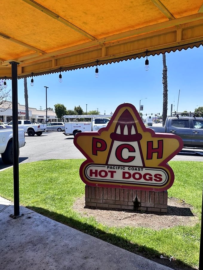 The PCH sign stands guard, promising delicious refuge from ordinary meals. Those three letters spell salvation for the famished.