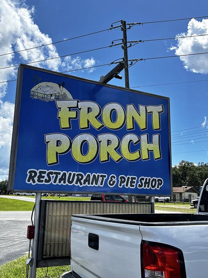 The blue and yellow sign proudly announces "Restaurant & Pie Shop"—two magical words that promise satisfaction against that perfect Florida sky.
