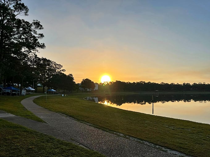 Sunset over Lake DeFuniak transforms the ordinary into the extraordinary – nature's nightly masterpiece reflected in perfect symmetry.
