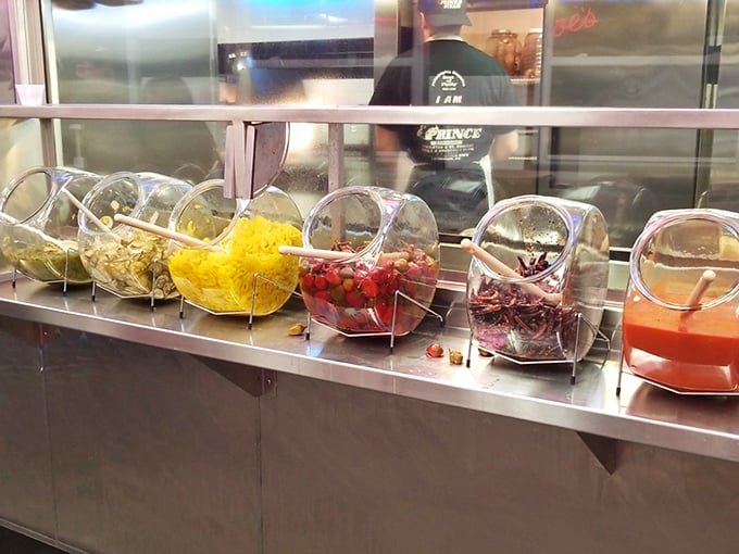 The condiment station stands ready, though purists know the perfect cheesesteak needs little embellishment.