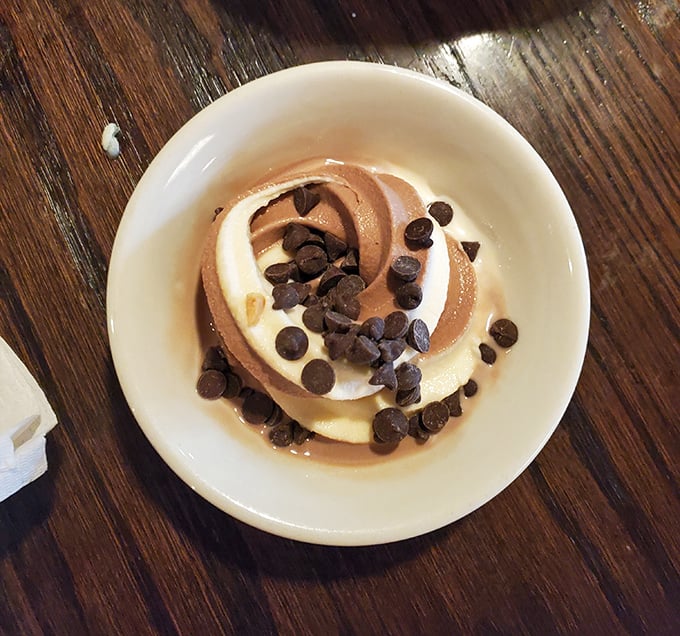 Chocolate and vanilla swirled soft serve topped with chocolate chips—simple, nostalgic, and exactly what your inner child ordered.