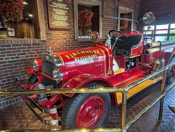 This vintage fire engine isn't just for show—it's a gleaming red reminder of the building's history and the five-alarm flavor awaiting you.