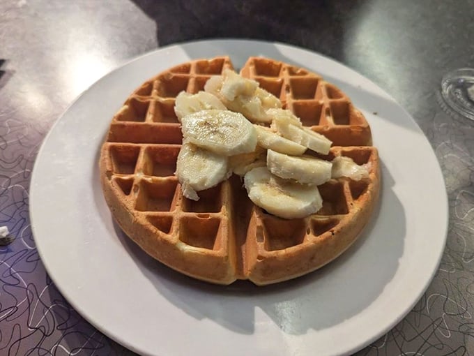 This waffle isn't just breakfast – it's an edible grid system perfectly engineered to hold maximum butter and syrup in every square.