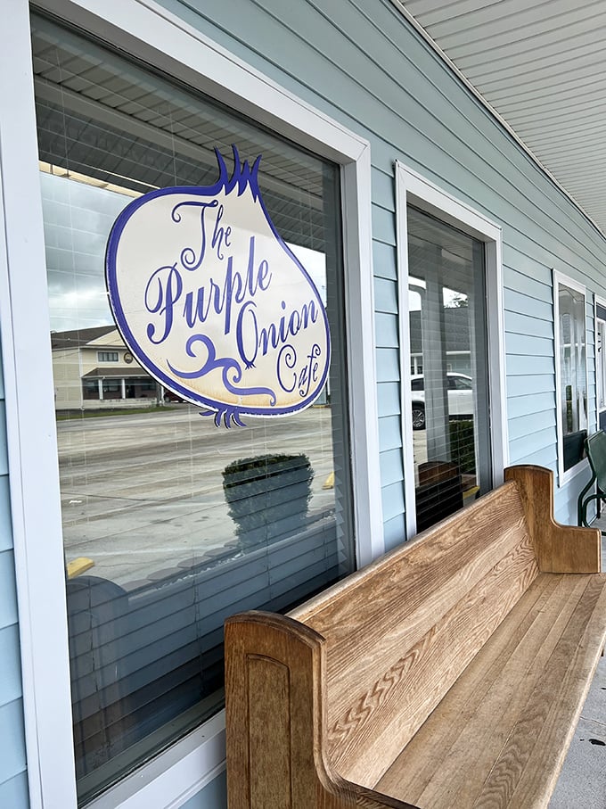 That wooden bench outside isn't just seating—it's where friendships form while waiting for tables, united by the promise of excellent food.