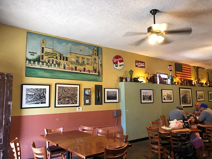 Walls that tell stories – vintage photographs and local art create an atmosphere where eating isn't just sustenance, it's a cultural experience.