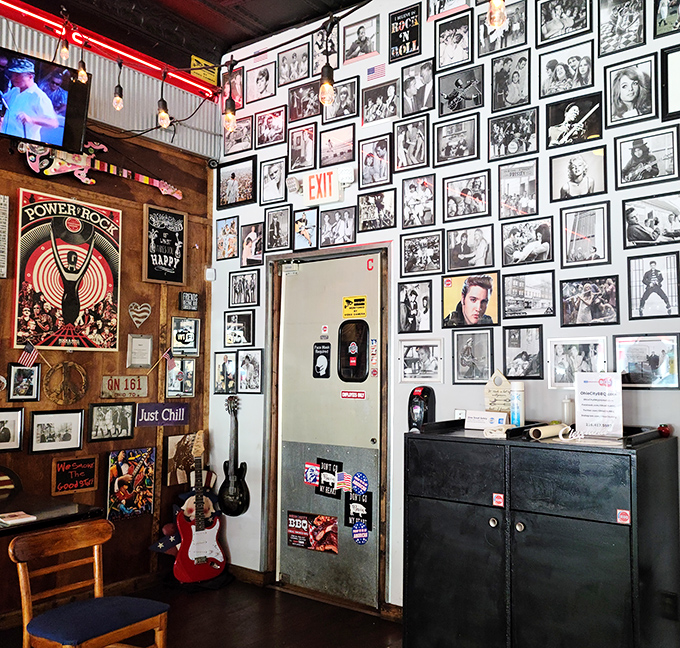 Not just decoration—this wall tells stories. Each frame and memento represents a piece of music history, creating an atmosphere as rich as the barbecue.