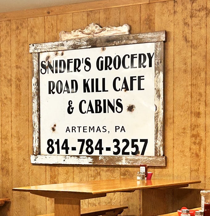This vintage sign reveals the cafe's triple identity—part grocery, part restaurant, part lodging. A one-stop shop for all your countryside needs, with character to spare.